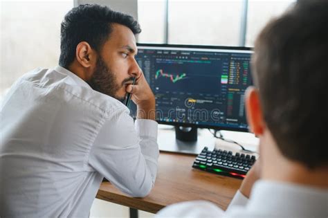 side view of smart indian crypto trader investor analyst broker