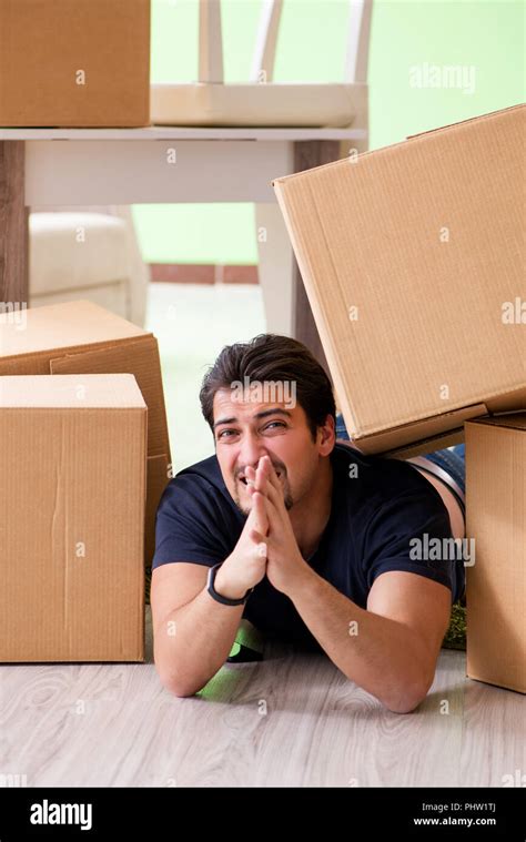Man Moving House With Boxes Stock Photo Alamy