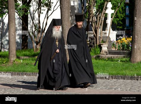 Two Russian Eastern Orthodox Priests Inside The Trinity Lavra Of St