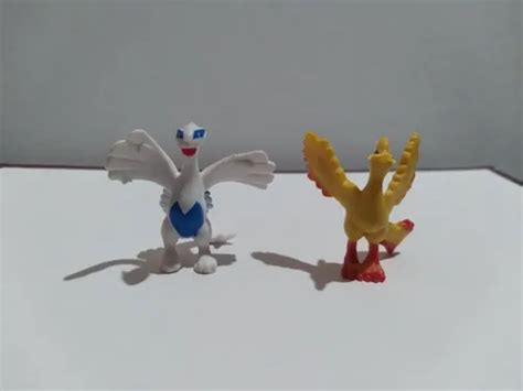 Pokémon Miniatura De Lugia E Moltres Mercadolivre