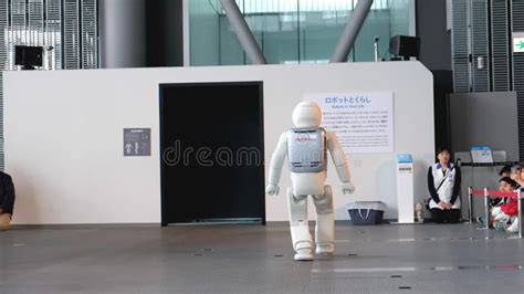 Asimo Humanoid Robot Walking And Gesticulating In Miraikan Museum Demonstration Stock Video