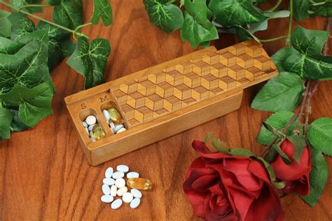 Geometric Wood Art Wood Pill Box In Cube Design Laser Engraved Solid Cherry Weekly Pill