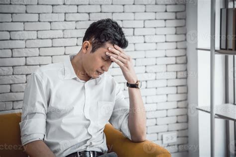 Businessman Young Asian Having A Migraine Or Headache Struggle With