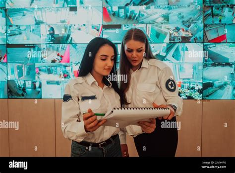 group of female security operators working in a data system control