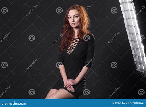 Red Haired Model Posing In Studio On Dark Background Stock Image Image Of Attractive Lingerie