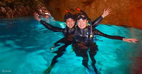 Okinawa Blue Cave Snorkeling And Diving Experience Entering The Water From The Shore Without