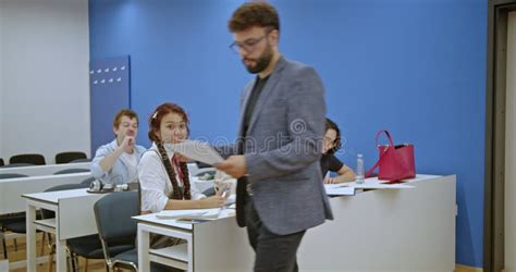 Students Working On Individual Tasks Or Exam During Class Professor