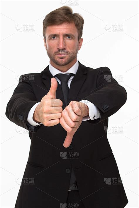 商人向上和向下显示拇指