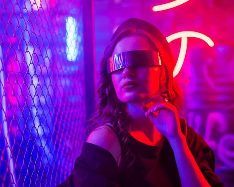 Premium Photo Portrait Of Young Woman Wearing Sunglasses