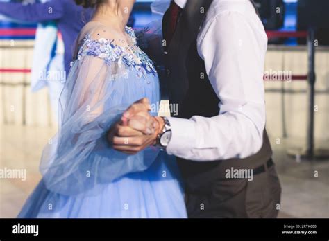 High School Graduates Dancing Waltz And Classical Ball Dance In Dresses