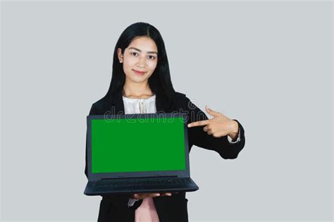Business Man And Business Woman Working In Green Screen Laptop Stock
