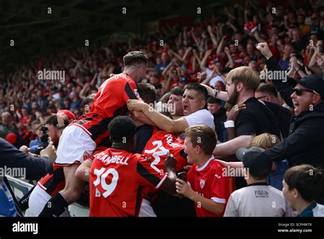 Morecambes Daniel Ogwuru Obscured Celebrates With The Fans After