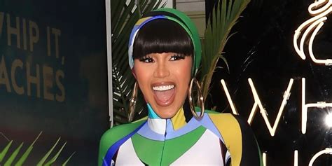 Cardi B Shows Off Her Curves In Vibrant Figure Hugging Bodysuit At Launch Party For Her New