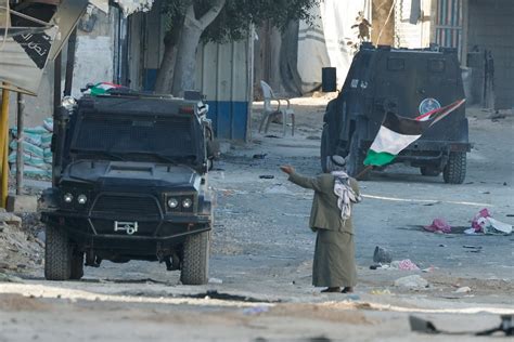 Palestinian Security Forces Clash With Militants In West Bank Reuters