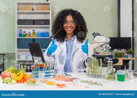Portrait Of Microbiologist Researcher Woman Analyzing Gmo Leaf Sample
