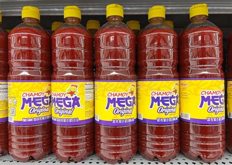 Grocery Store Shelf With Bottles Of Chamoy Mega Original Chamoy Sauce Commonly Used As A Dip