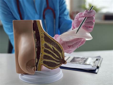 Doctor Demonstrates Breast Implant Rupture Using An Anatomical Model