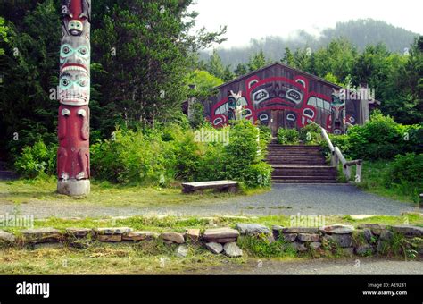 Totem Poles And Longhouse In Saxman Village Near Ketchikan Alaska Usa
