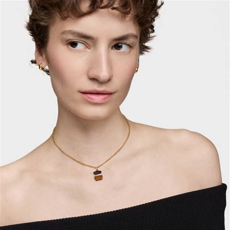 Dije Con Baño De Oro 18 Kt Sobre Plata Sodalita Y Ojo De Tigre Sweet