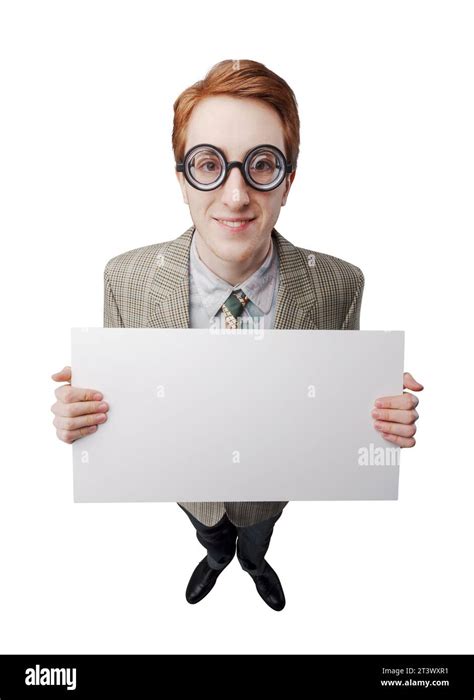 Funny Nerd Guy With Thick Glasses He Is Holding A Blank Sign And Smiling Stock Photo Alamy