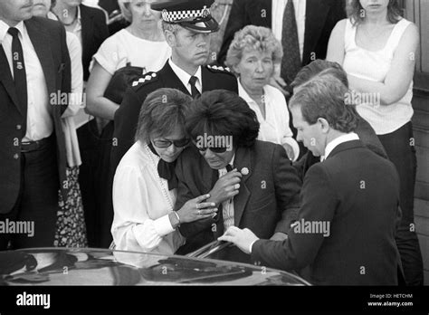 File Photo Dated 110985 Of Dame Shirley Bassey Being Helped To Her Car After Attending The