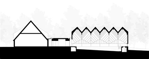 duggan morris design swimming pool with angular wooden roof