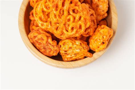 A Pile Of Spicy Indonesian Crackers Or Kerupuk With Spiral Twists