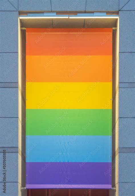 Gay Pride Flag Placed On The Window Of A Building Stock Photo Adobe Stock