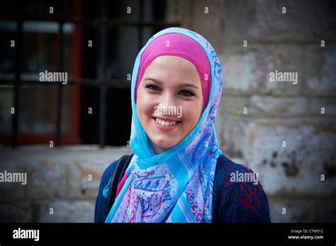 Portrait Of Smiling Young Muslim Woman Girl Wearing Veil Hijab