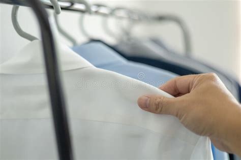 Man Is Choosing Shirt In The Clothes Room Stock Image Image Of Diversity Fashionable