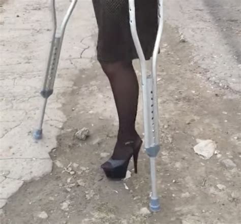 Amputee Woman Walking With His Only Remaining Leg By Entertainment54ok