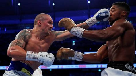 Украинский боксер Усик сенсационно отбил у британца Джошуа чемпионские ...