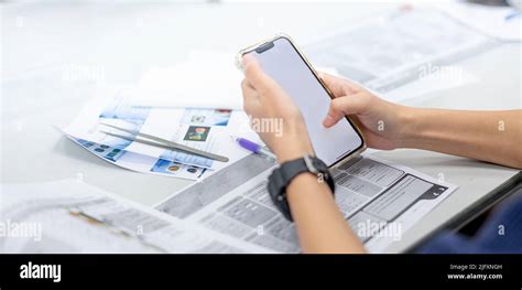 The Female Hand Uses The Internet Smartphone To Check The Type Of