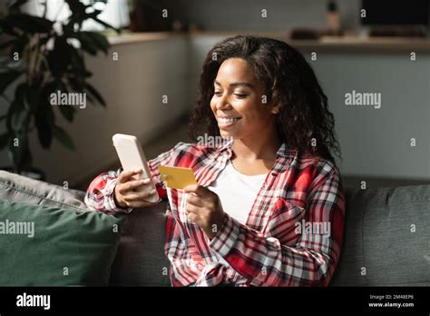 Glad Smiling Pretty Millennial Black Lady Checking Bank Account