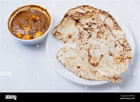 Indian Traditional Food Chapati Or Naan Roti With Paneer Butter Masala
