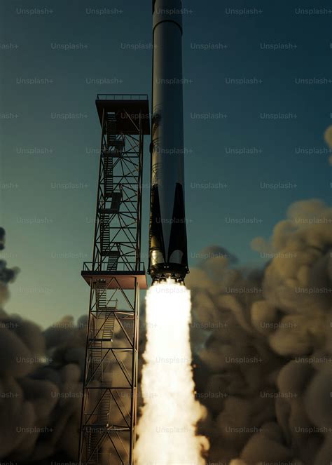 A Rocket Launching Into The Sky With Smoke Coming Out Of It Photo