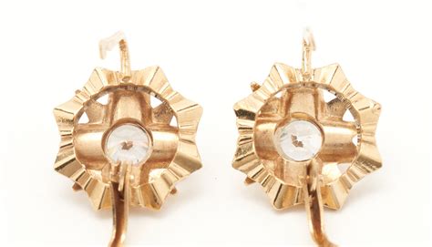 Lot 552 18k Gold And White Zircon Dangle Earrings Case Auctions