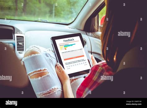 Woman Writes A Customer Review And Leaves Rating On The Tablet Customer Experience And Feedback