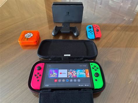 Nintendo Switch Oled 64gb 4 Controles E Mais De 10 Jogos Jogos De Vídeo Game Vila Nova
