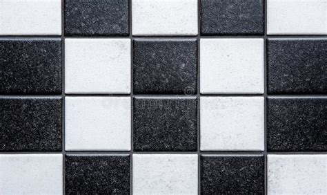 Classic Black And White Checkerboard Tile Pattern Creates A Timeless And Versatile Background