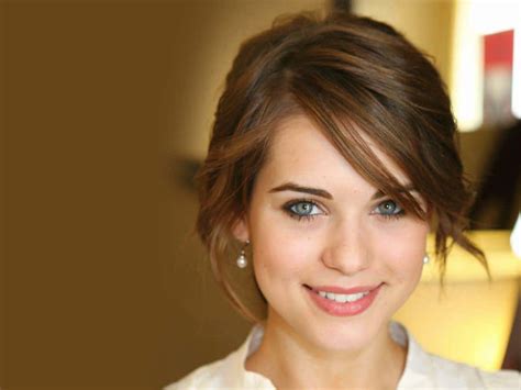 Download Free Lyndsy Fonseca Posing Elegantly In A Photoshoot Wallpaper