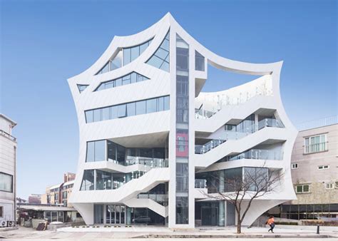 Concave Walls Give Scalloped Outline To Block By Khm