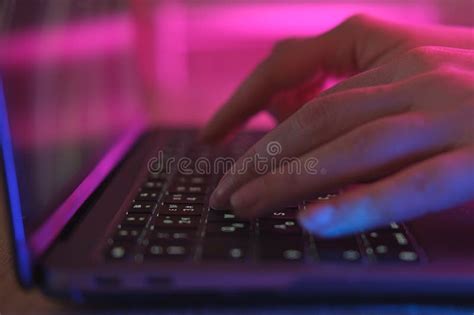 Person Typing At Laptop Computer At Night Female Uses Keyboard Shakes