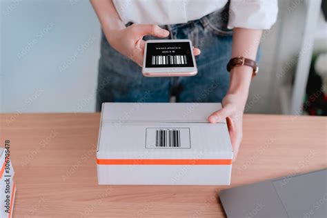 Babe Woman Owner Using Smartphone For Checking Product On Stock Scan Qr Code To Check The