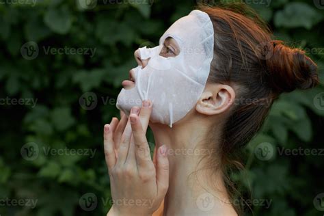 Portrait Of A Girl White Mask Outdoors Side View Naked Shoulder Bare Shoulders Stock