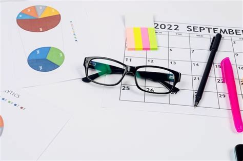 Premium Photo Working Set For Analyzing Statistics Charts And Graph With Financial Data Glasses