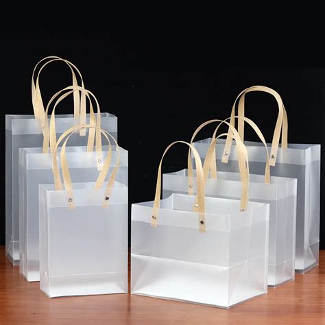 10pcs 반투명 비닐 봉투 종이 손잡이와 서리로 덥은 가방 하드 플라스틱 패키지 선물 가방 Aliexpress