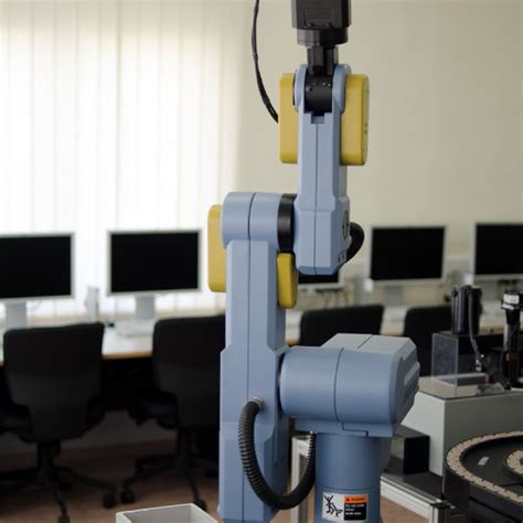 The Robot Arm And The Workspace Used For The Assembly Cell Download Scientific Diagram