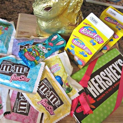 Assorted Candy Bars On Wooden Table