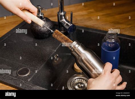 Washing Cleaning Reusable Drinking Bottle With Coconut Fiber Bottle Cleaning Brush In Home